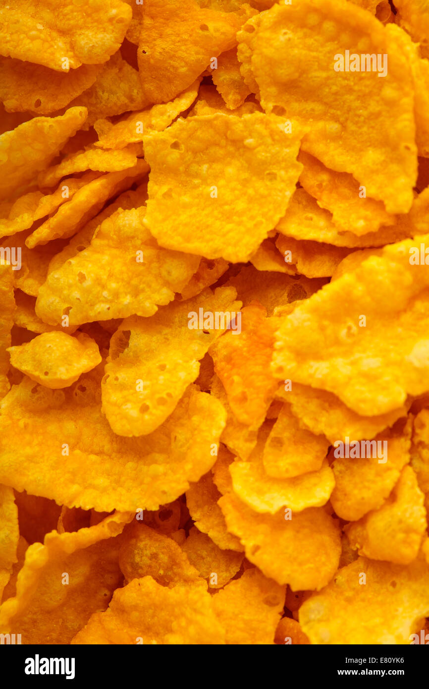 Closeup of many corn flakes breakfast morning meal as food background ...