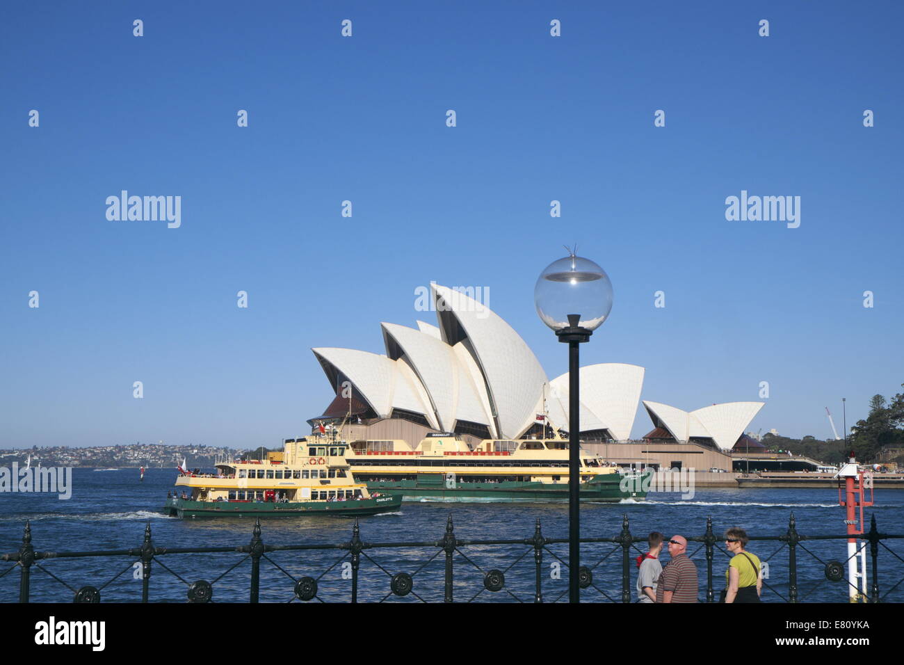 Sydney ferries passing the Sydney opera house at bennelong point on a ...