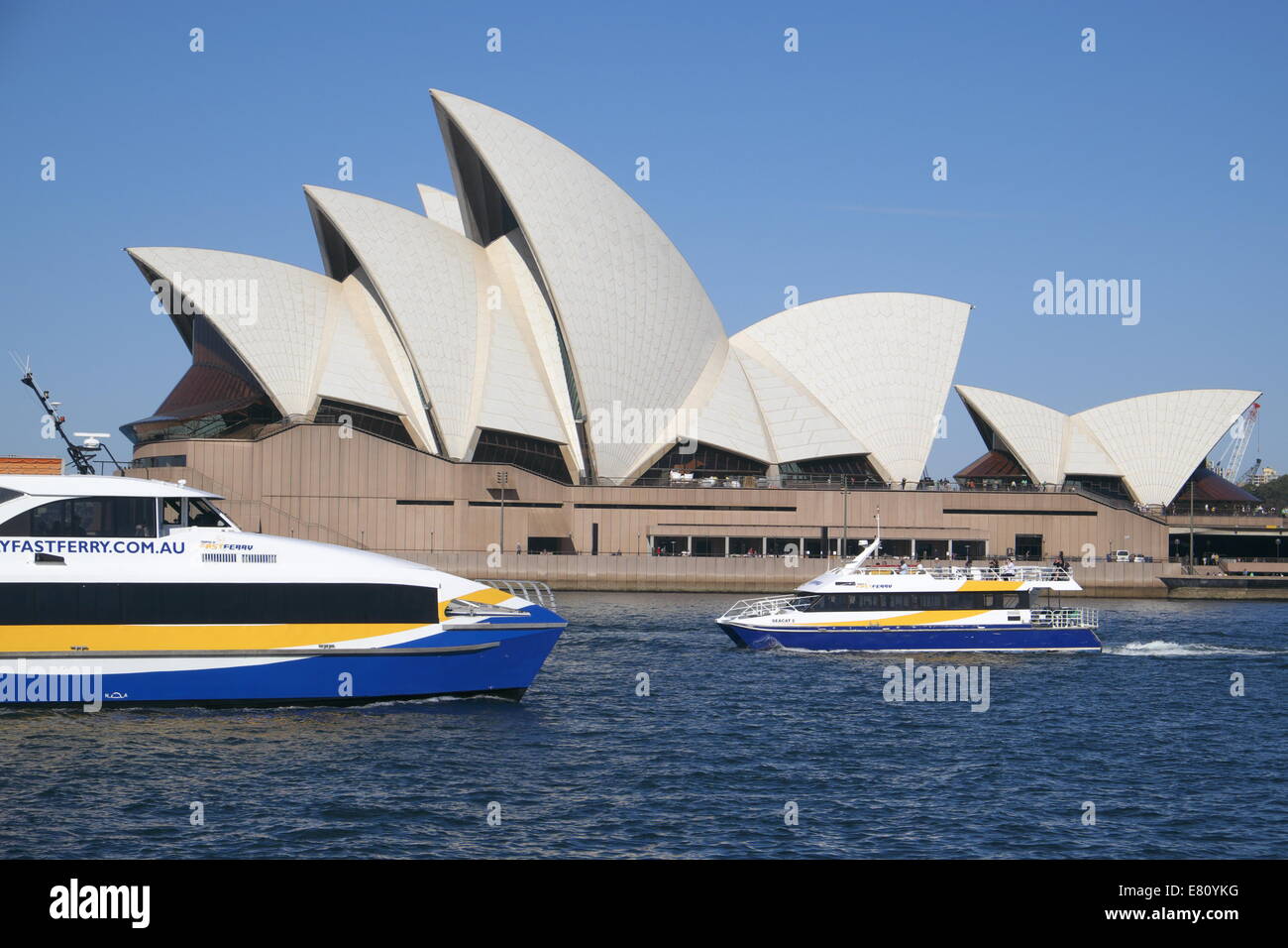 Sydney opera house with Manly fast ferry passing,Sydney,australia Stock ...