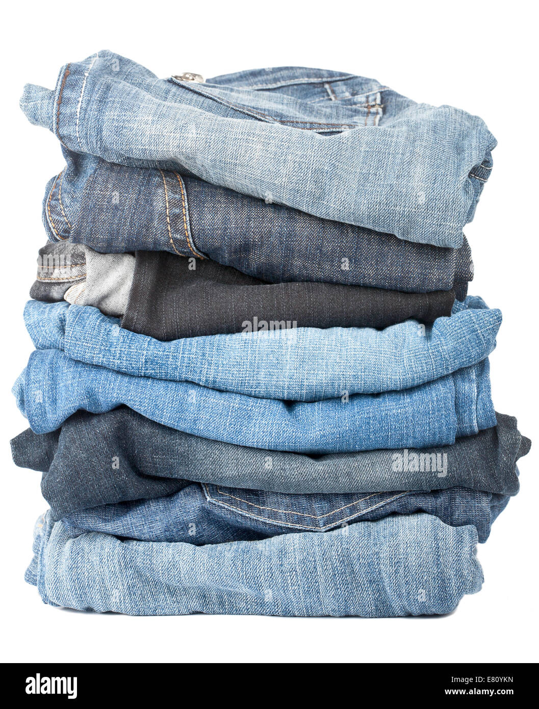 Stack of jeans isolated on white background Stock Photo - Alamy
