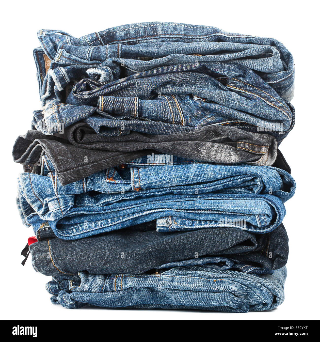 Stack of jeans isolated on white background Stock Photo - Alamy