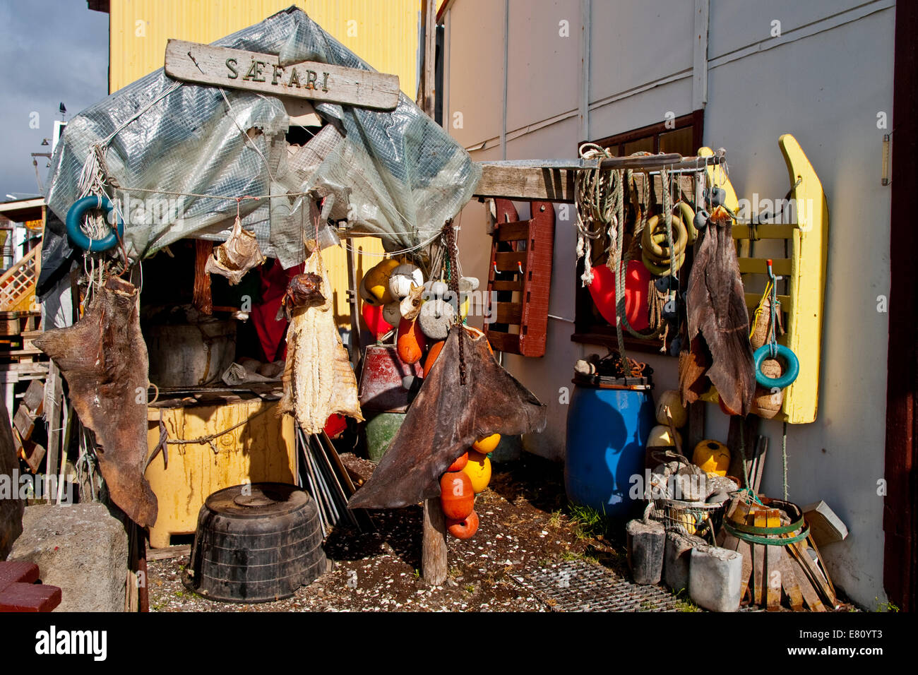 Tackle fishing and dried fish on a port warehouse. Old fishing port of ...