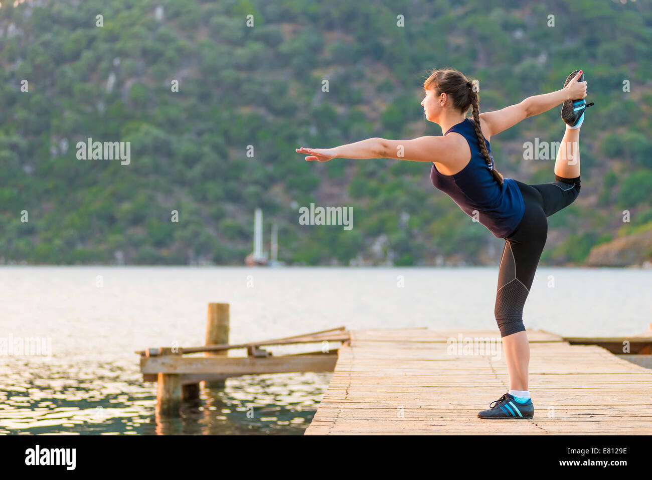 Morning stretching outdoors at the sea Stock Photo - Alamy
