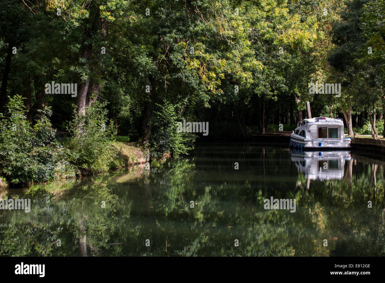 A cruising boat on the Charente river in Jarnac, France Stock Photo - Alamy
