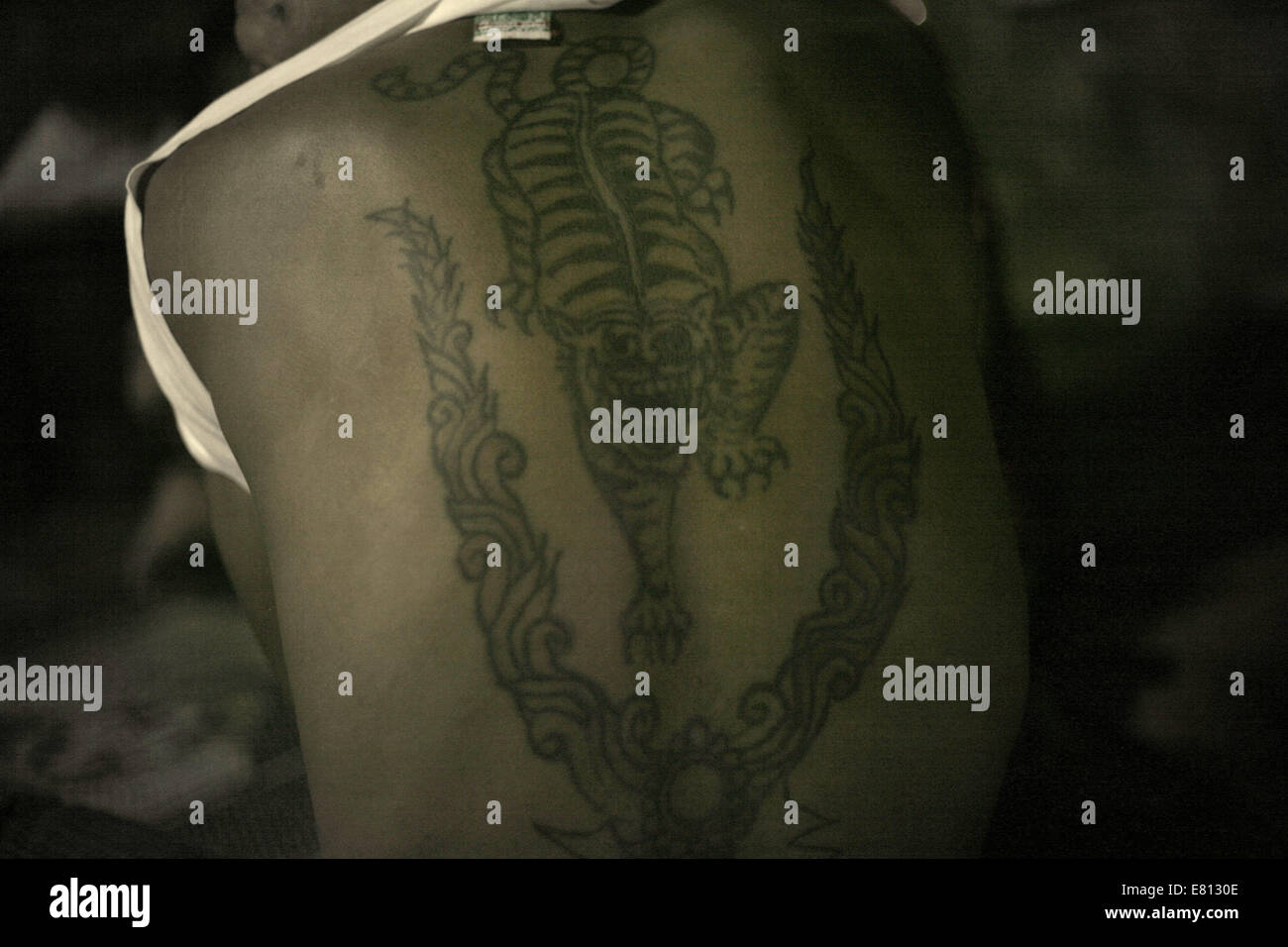 Umpiem, Umphang, Thailand. 28th Sep, 2014. A burmese refugee and 88 ...