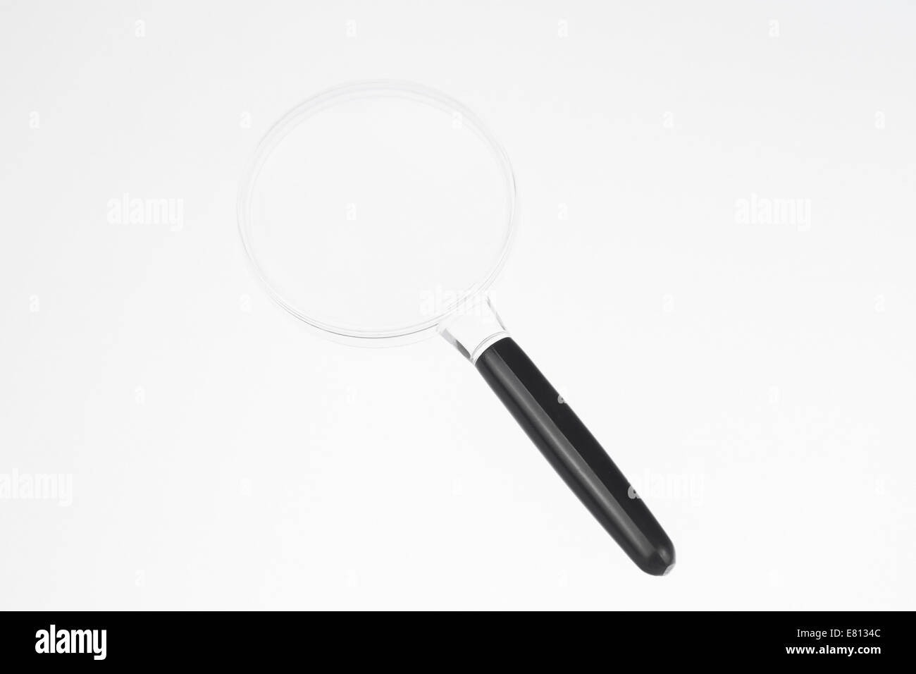 Magnifying glass on white background Stock Photo - Alamy