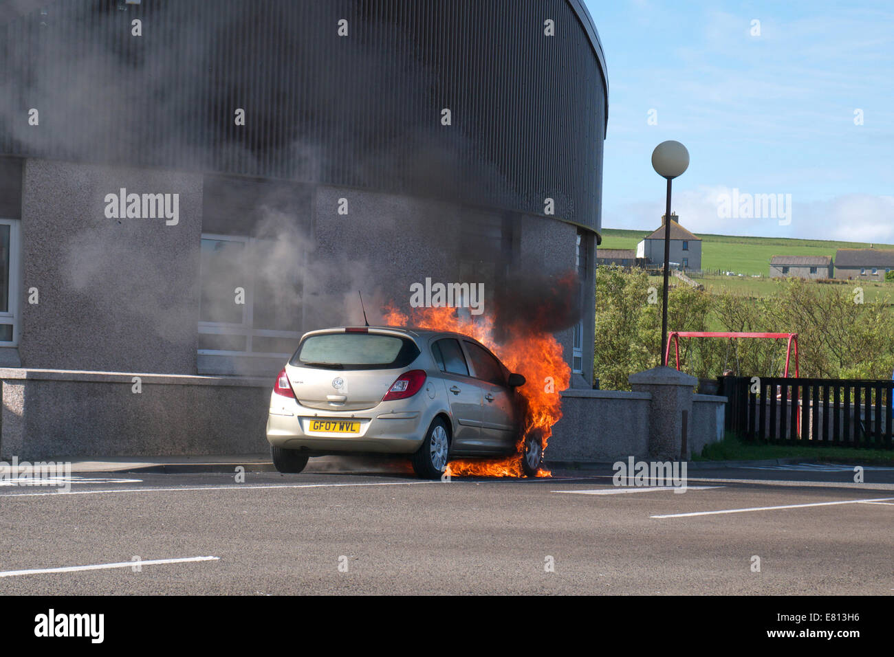 Car on fire Stock Photo - Alamy