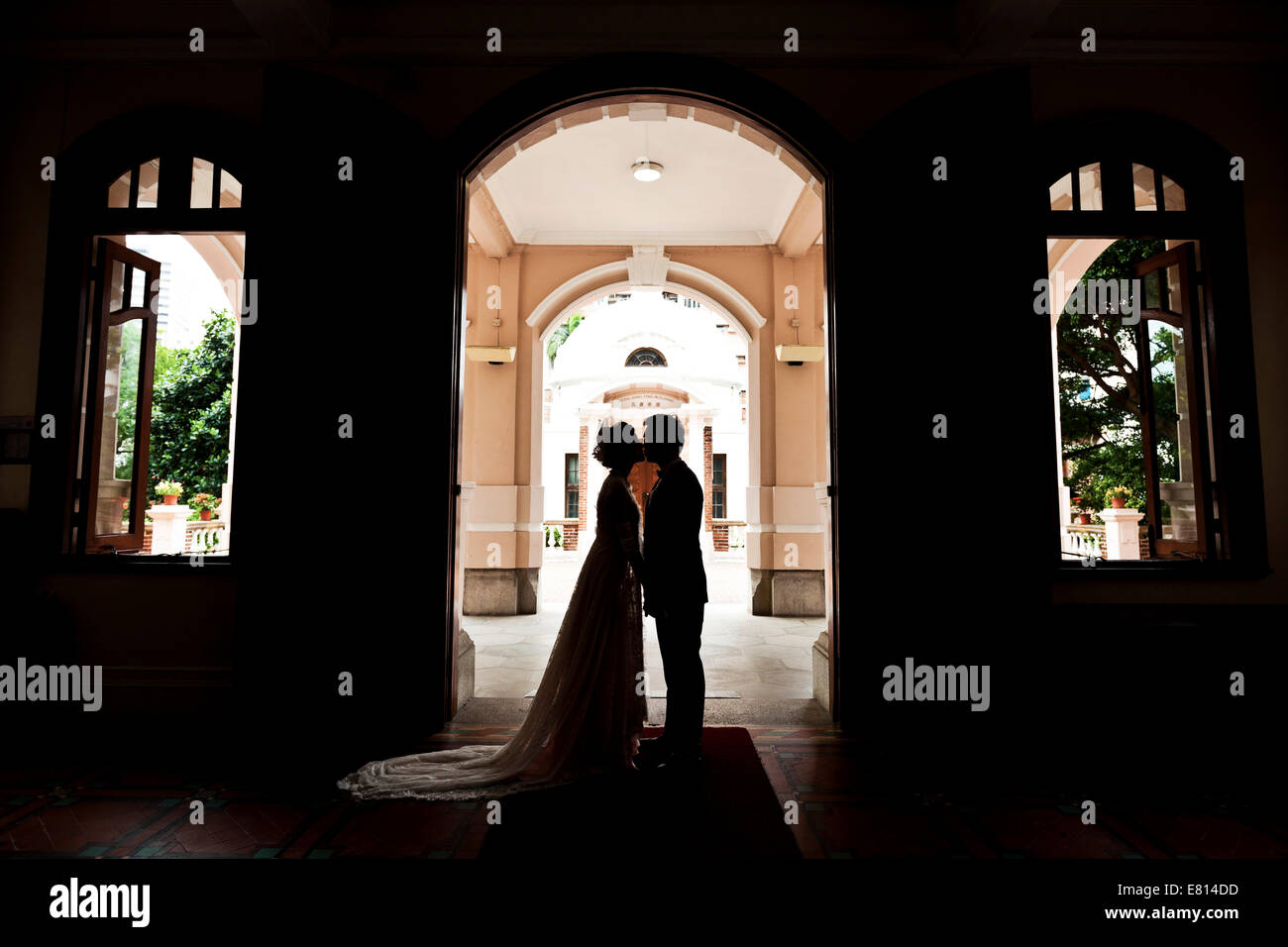 Couple in church Stock Photo - Alamy