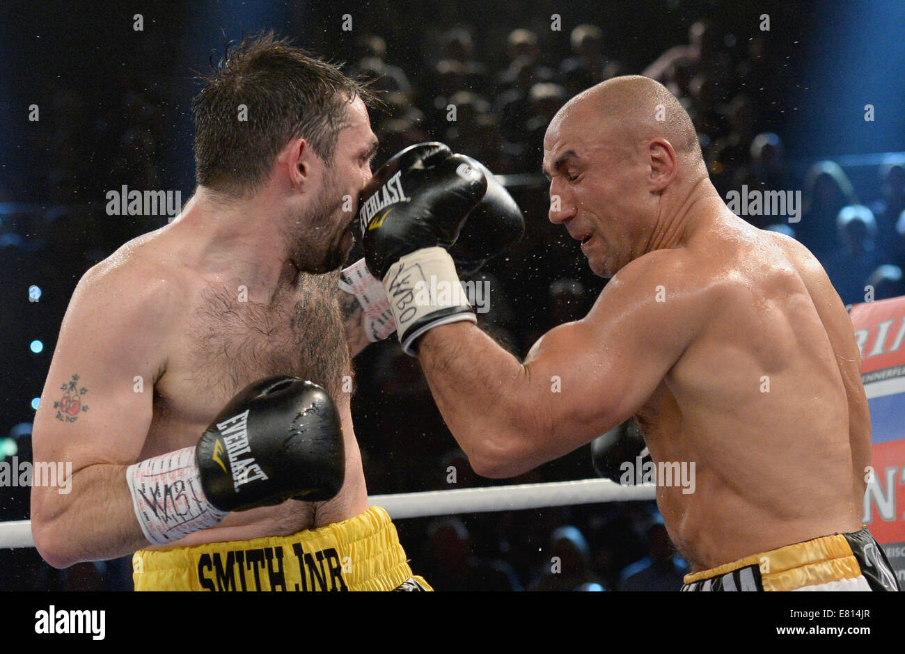 German boxer Arthur Abraham (R) boxes against his challenger Paul Smith ...
