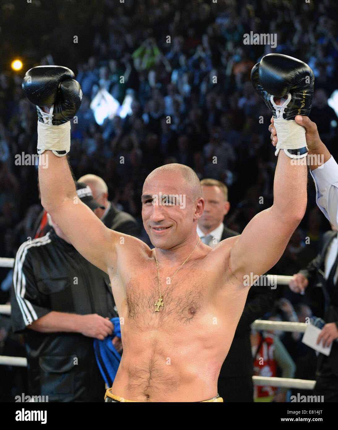 German boxer Arthur Abraham celebrates his victory against Paul Smith ...