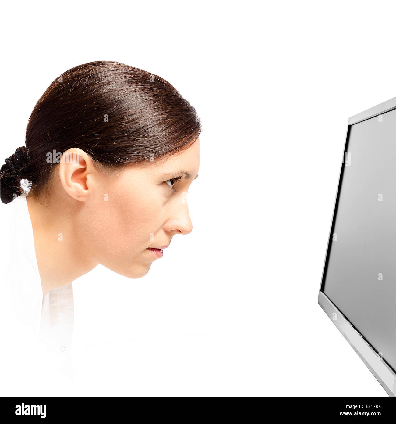 Woman staring at a computer monitor on a white background Stock Photo ...
