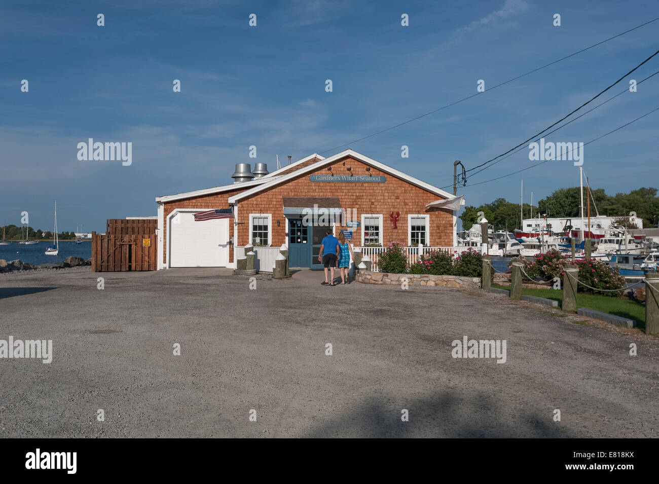 Two customers walking into Gardner's Wharf Seafood Market Wickford ...