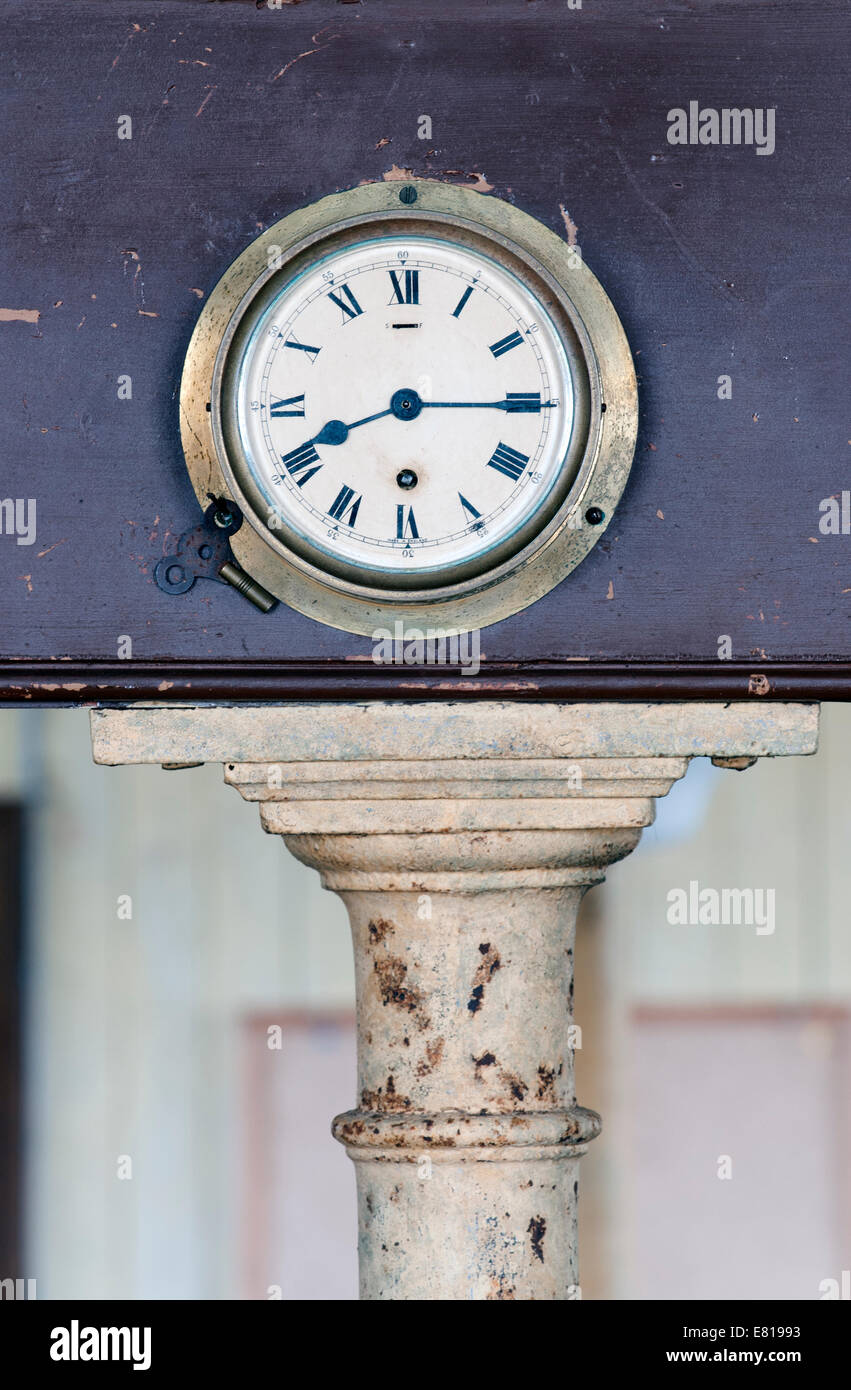 Old bulkhead clock in a church Stock Photo - Alamy