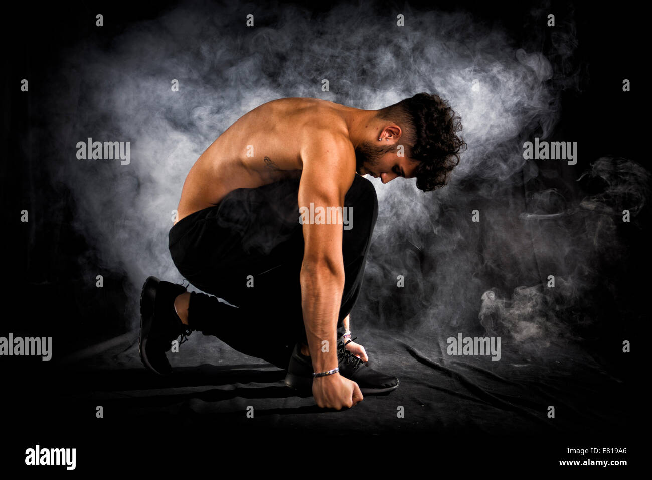 Person Kneeling Down