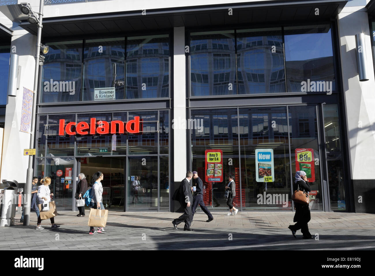 Shoppers walking past the Iceland store on the Moor in Sheffield city ...