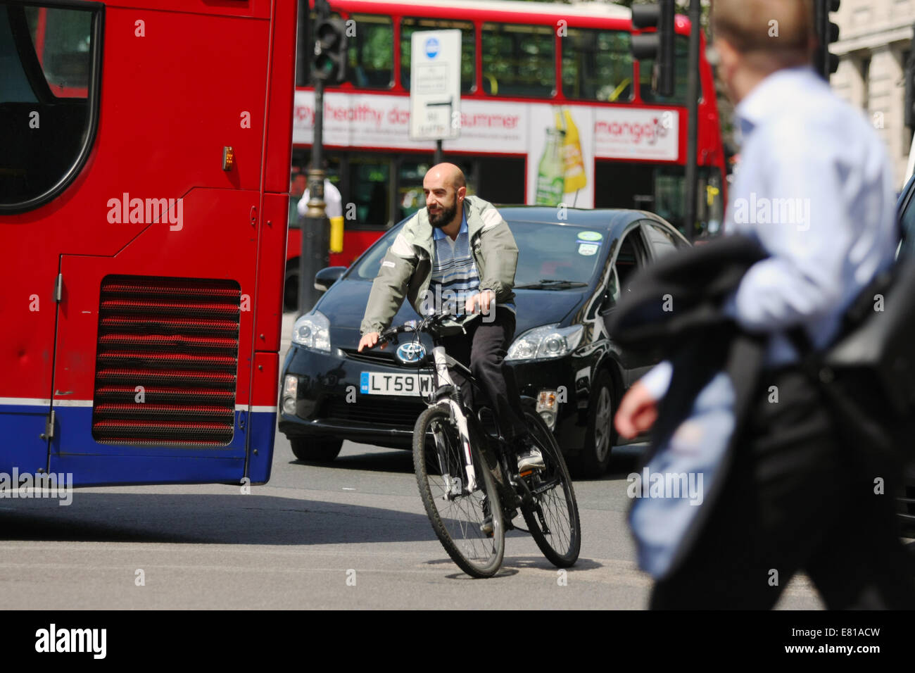 Car overtaking a bike hi-res stock photography and images - Alamy