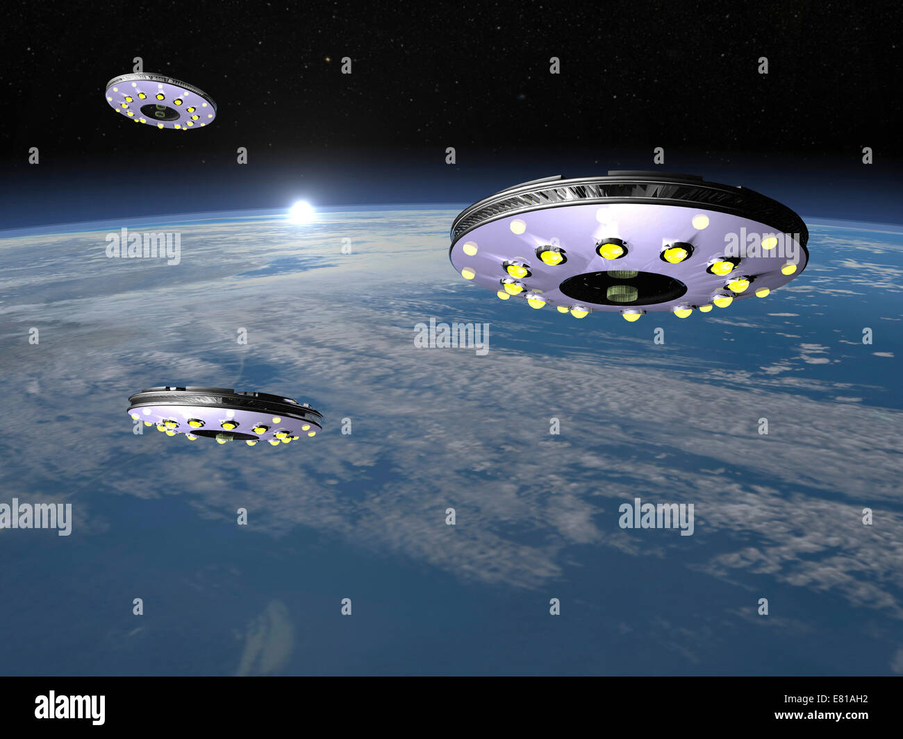 Three UFO's flying above planet Earth Stock Photo - Alamy