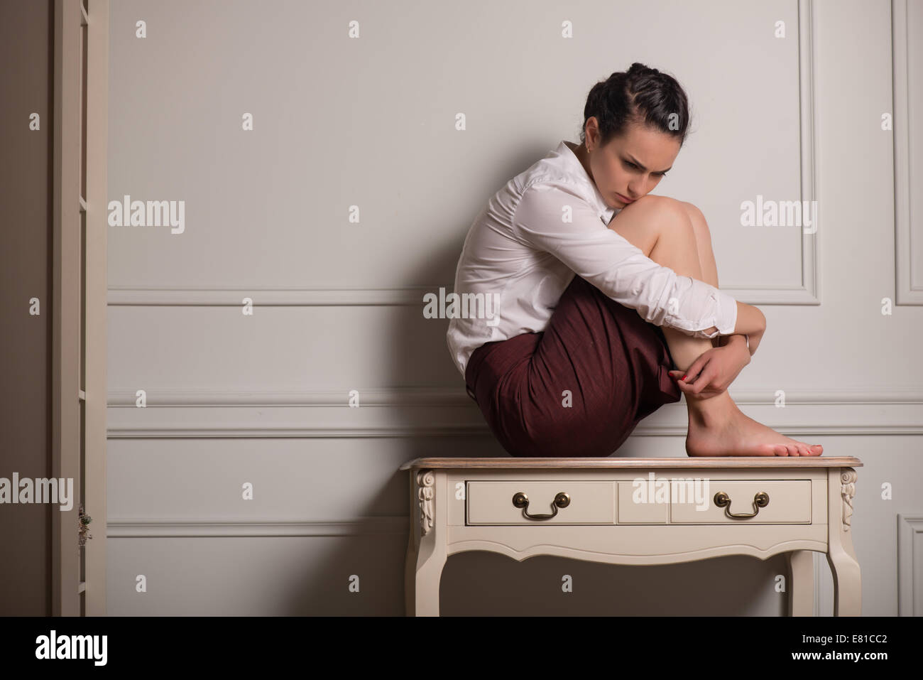 Business woman suffering from depression Stock Photo - Alamy