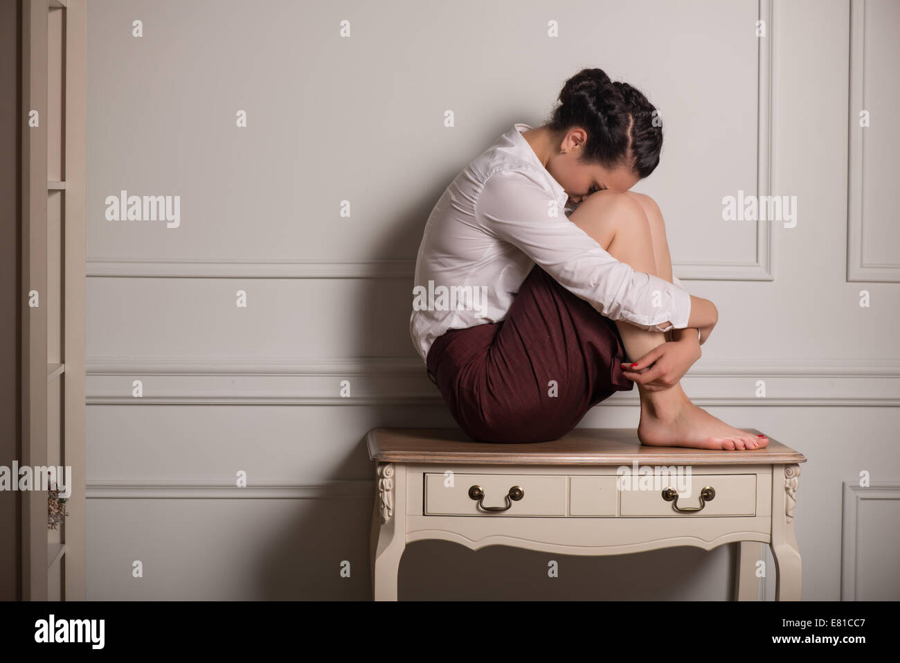 Business woman suffering from depression Stock Photo - Alamy