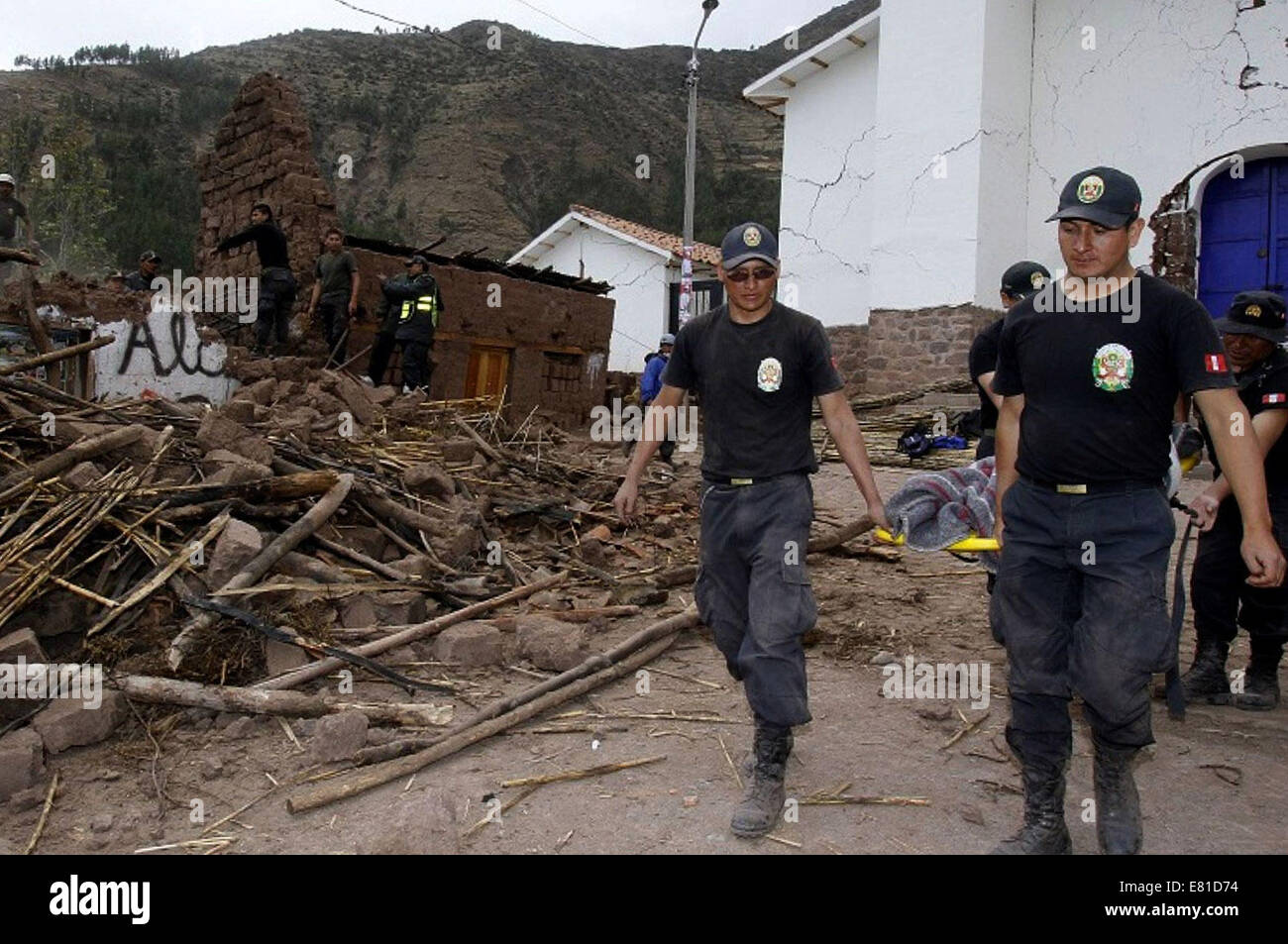Paruro, Peru. 28th Sep, 2014. Rescuers work after an earthquake in ...