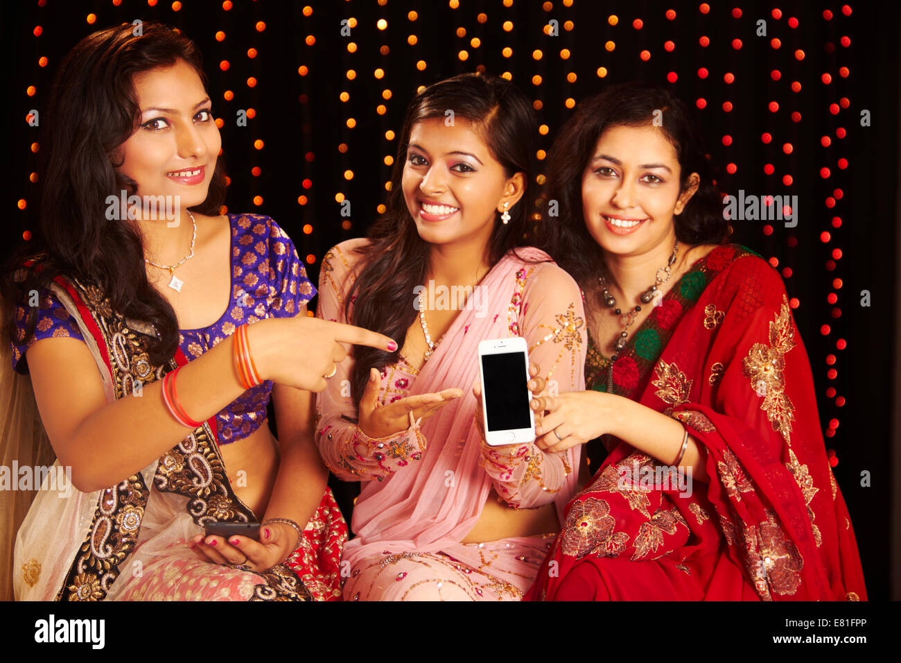 indian friends diwali Festival Showing phone Stock Photo - Alamy