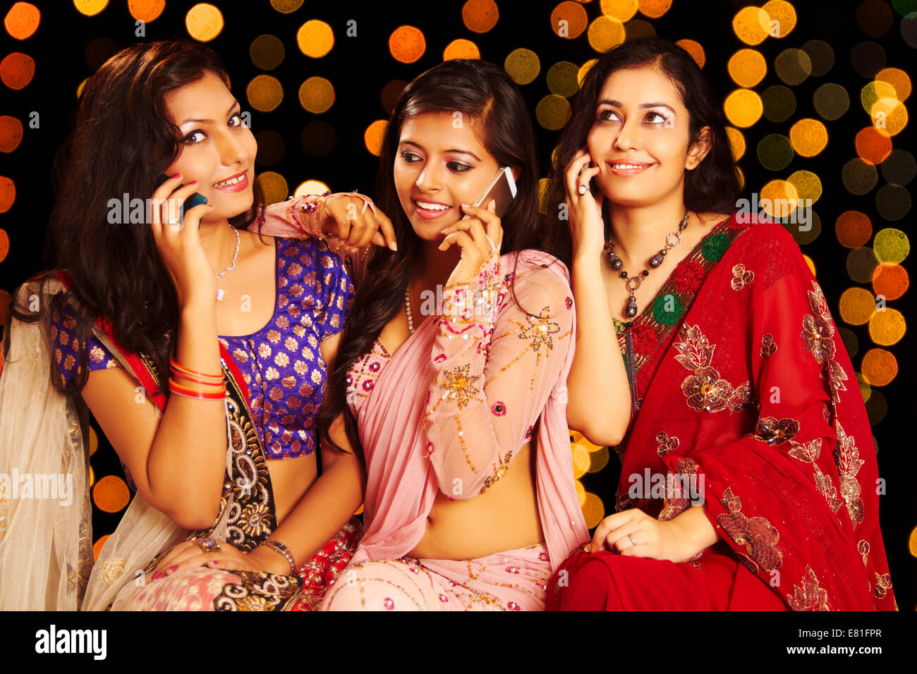 indian friends diwali Festival talking phone Stock Photo - Alamy