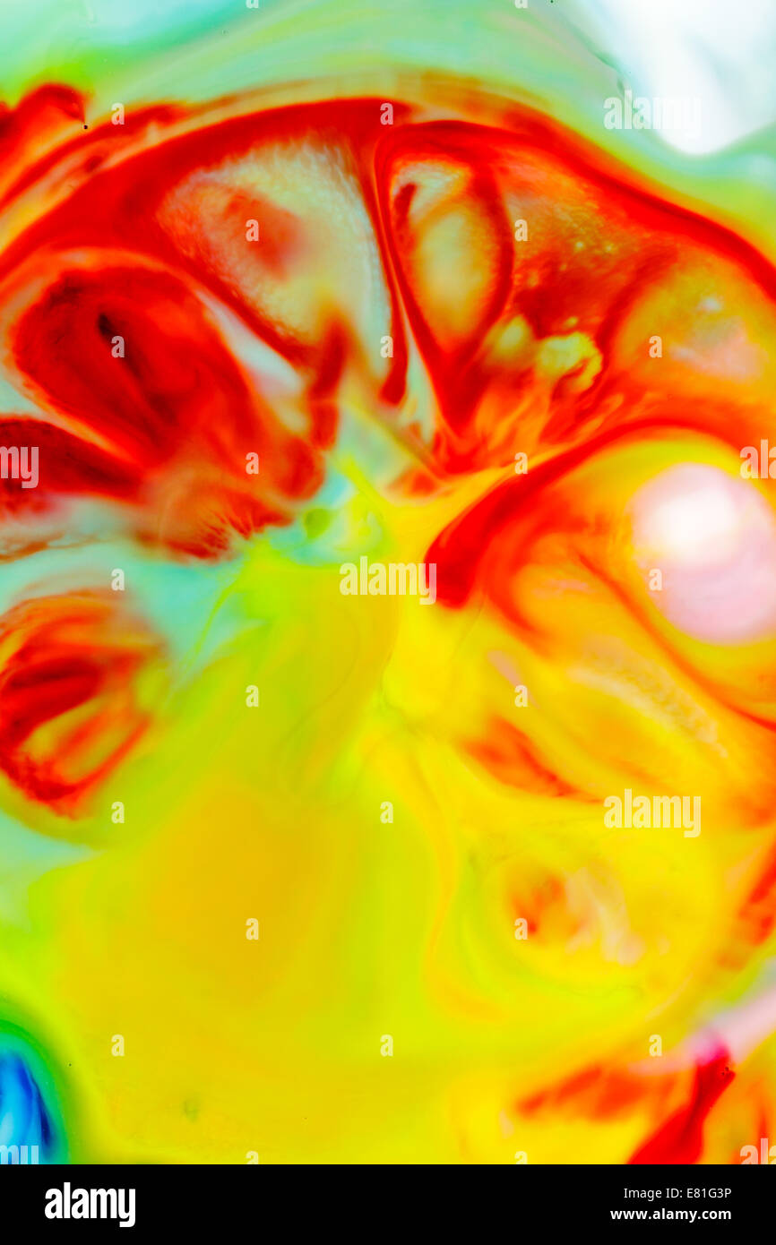 food coloring on milk abstract background Stock Photo - Alamy