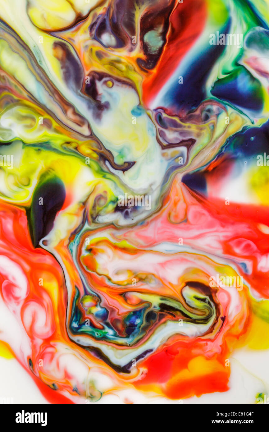 food coloring on milk abstract background Stock Photo - Alamy