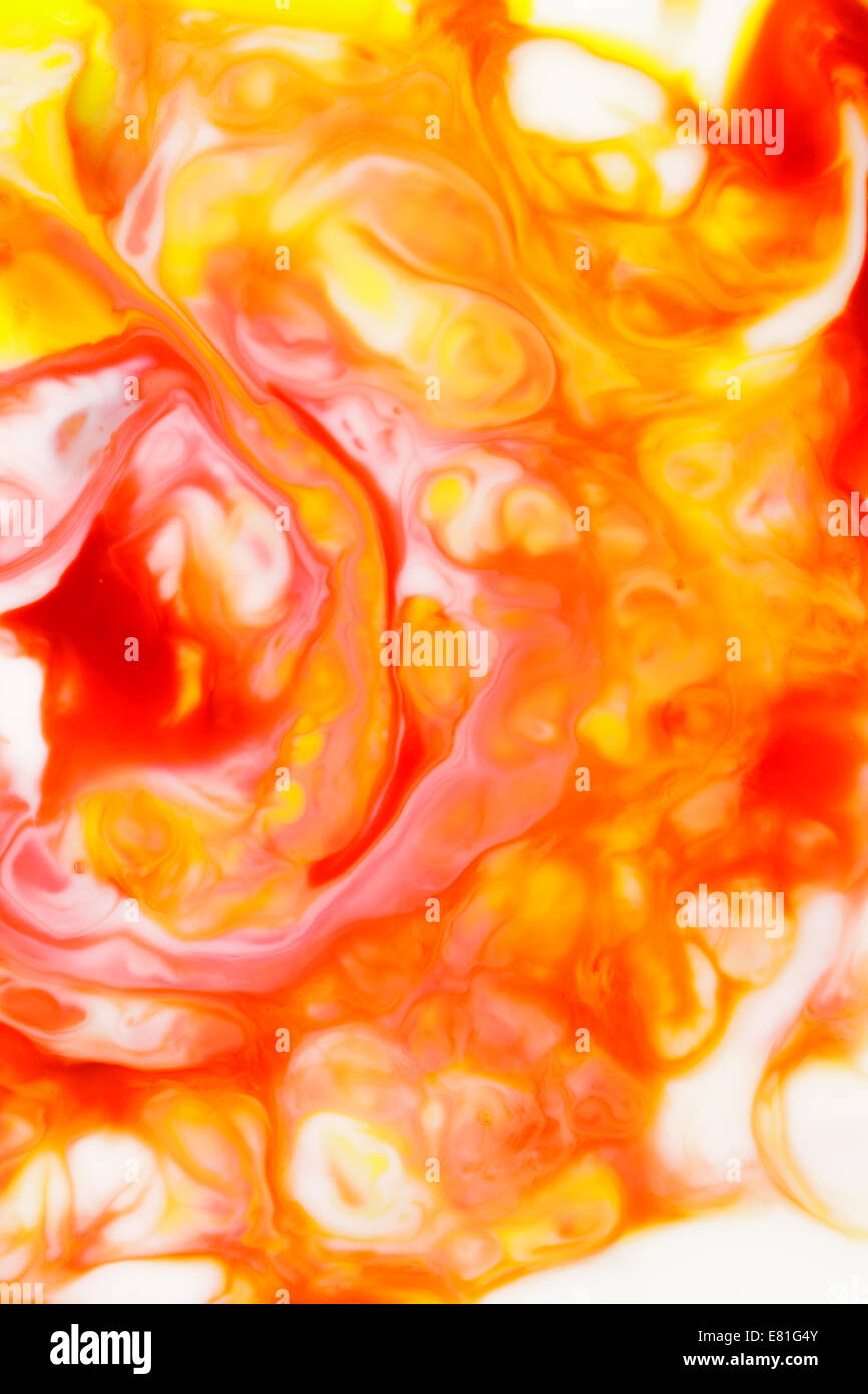 food coloring on milk abstract background Stock Photo - Alamy