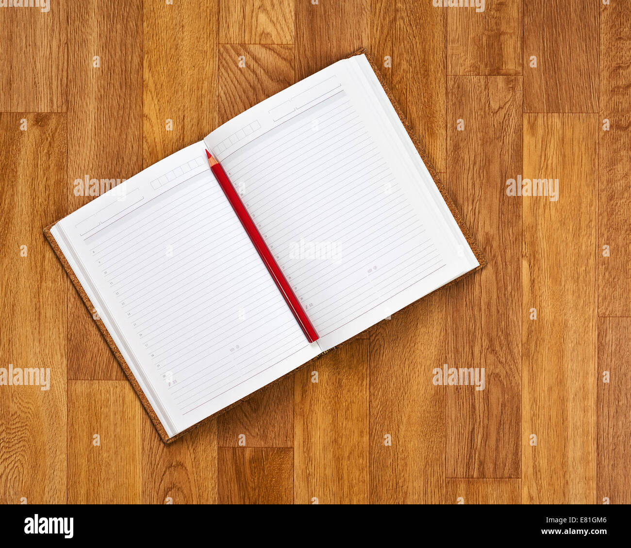 Blank notepad with office supplies on wooden table. Above view Stock ...
