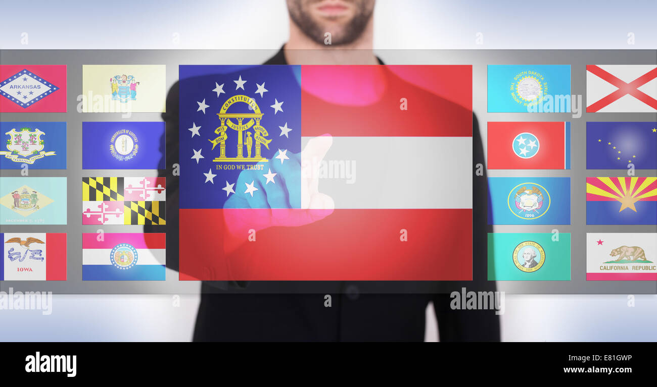 Hand pushing on a touch screen interface, choosing a state, Georgia ...