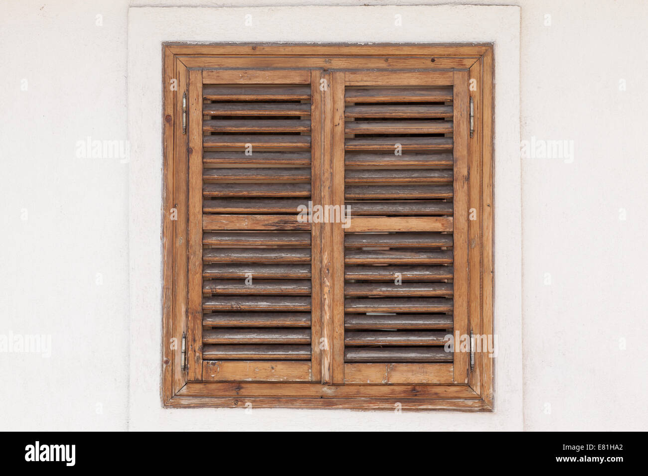 rustic window closed with wooden exterior shutters Stock Photo - Alamy