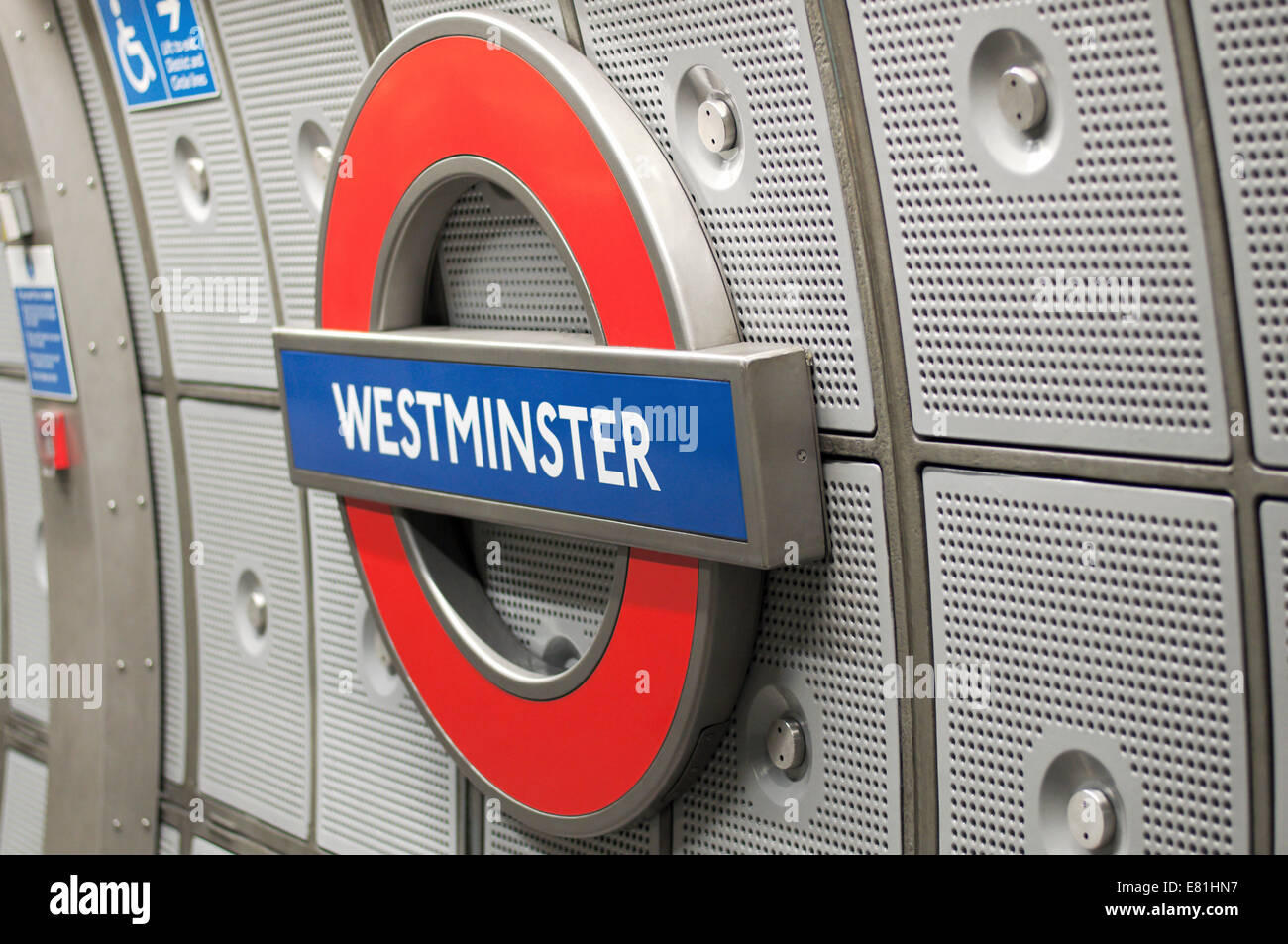 Westminster underground station metal logo close-up with shallow DOF ...