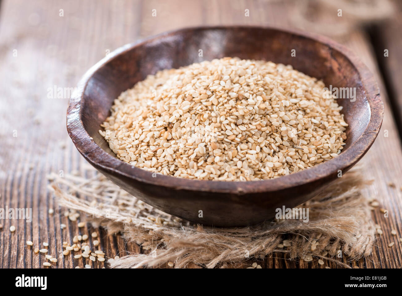 Portion of Sesame (detailed close-up shot) on wooden background Stock ...