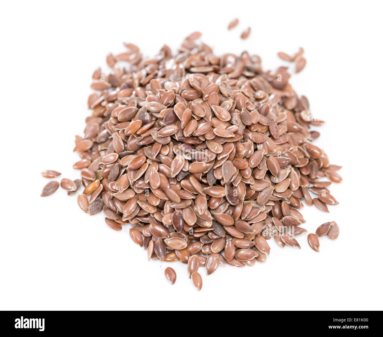 Portion of brown Linseeds isolated on pure white background Stock Photo ...