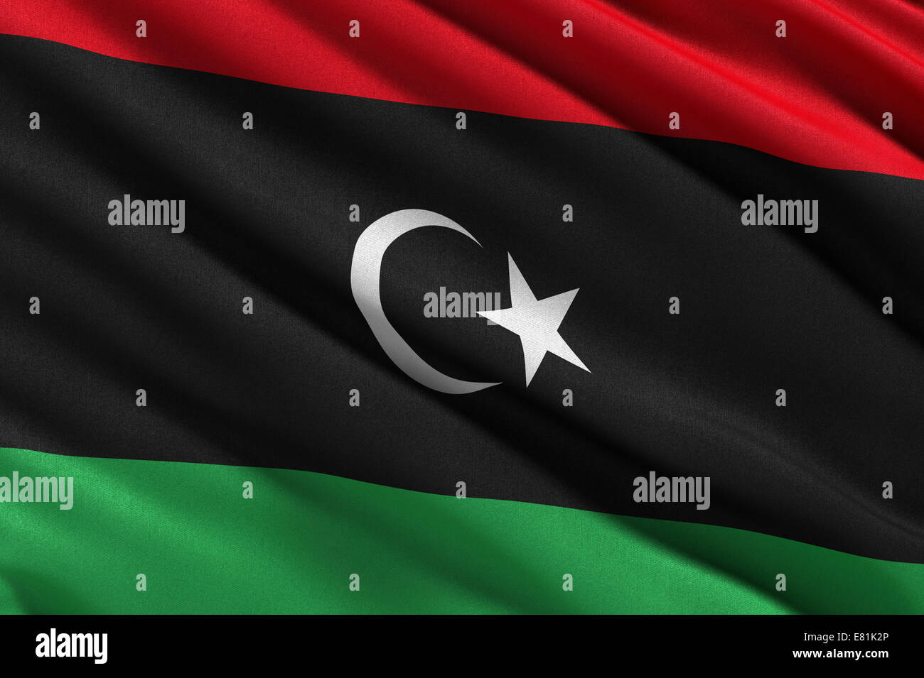 Flag of Libya waving in the wind Stock Photo - Alamy