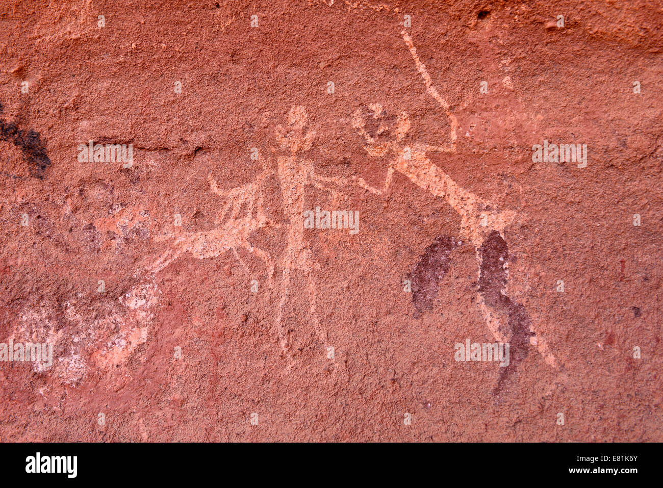 Rock painting of people with dogs hi-res stock photography and images ...