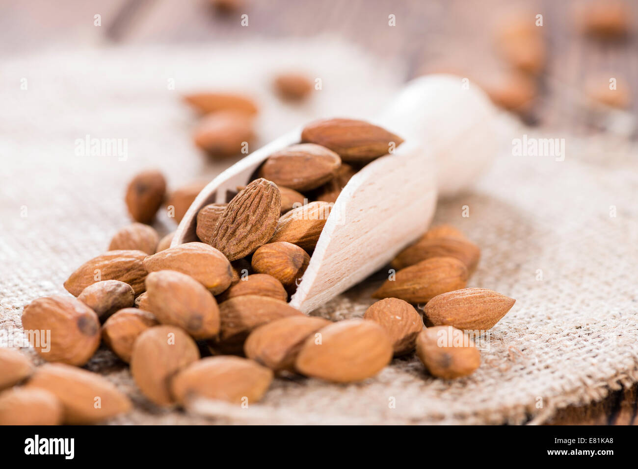 Portion of Almonds on a Wooden Spoon (close-up shot Stock Photo - Alamy