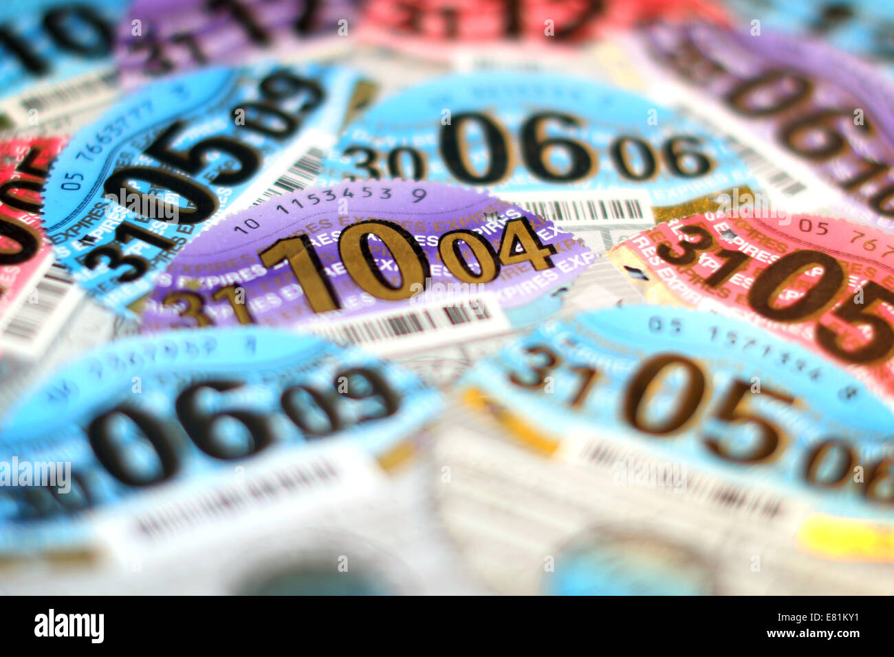 A close-up or abstract of multiple Britiish car tax discs Stock Photo ...