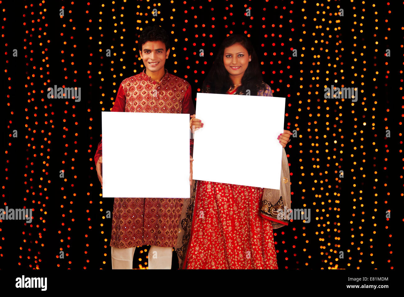indian couple Showing Message Board Stock Photo - Alamy