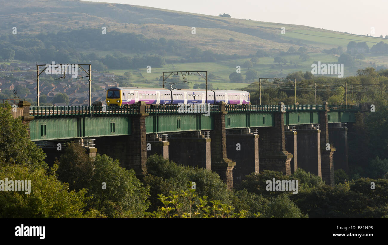 Northern Rail diesel multiple unit (DMU) travelling across the Dinting ...