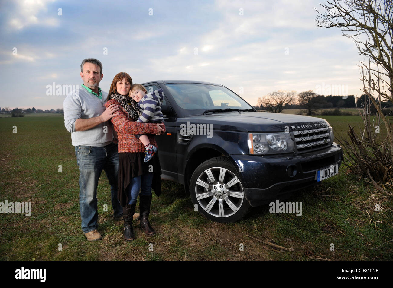 Family with a four wheel drive car UK Stock Photo - Alamy