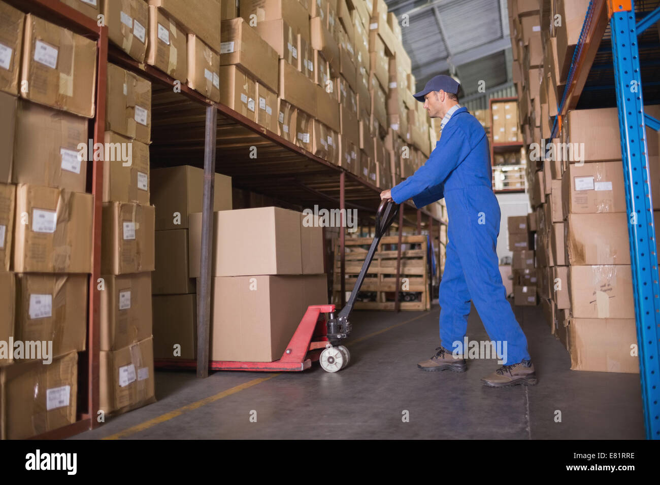 Warehouse pushing trolley hi-res stock photography and images - Alamy