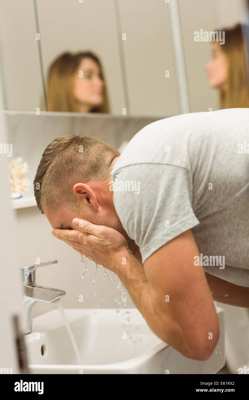 Cute couple getting ready in the morning Stock Photo - Alamy