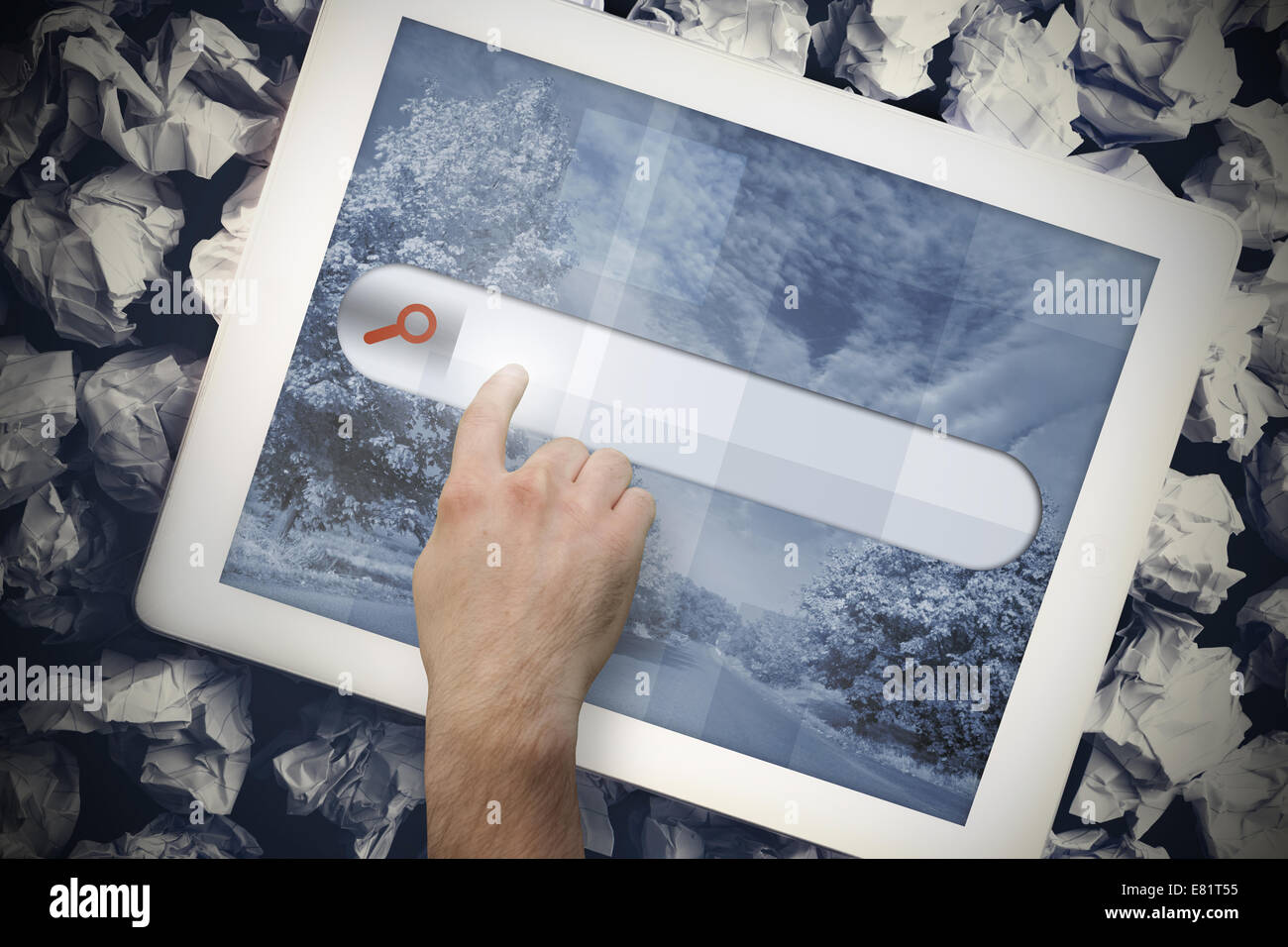Hands touching search bar on tablet screen Stock Photo - Alamy