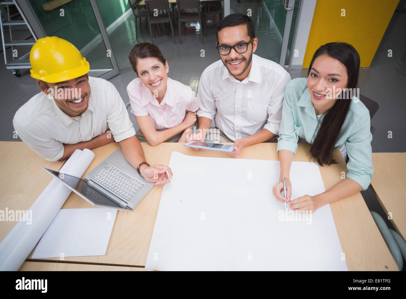 Architecture team working together at desk Stock Photo - Alamy