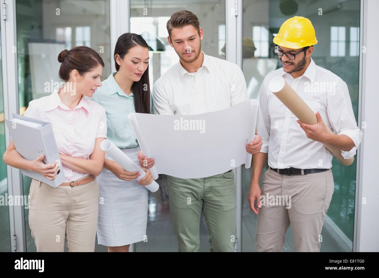 Casual architecture team working together Stock Photo - Alamy