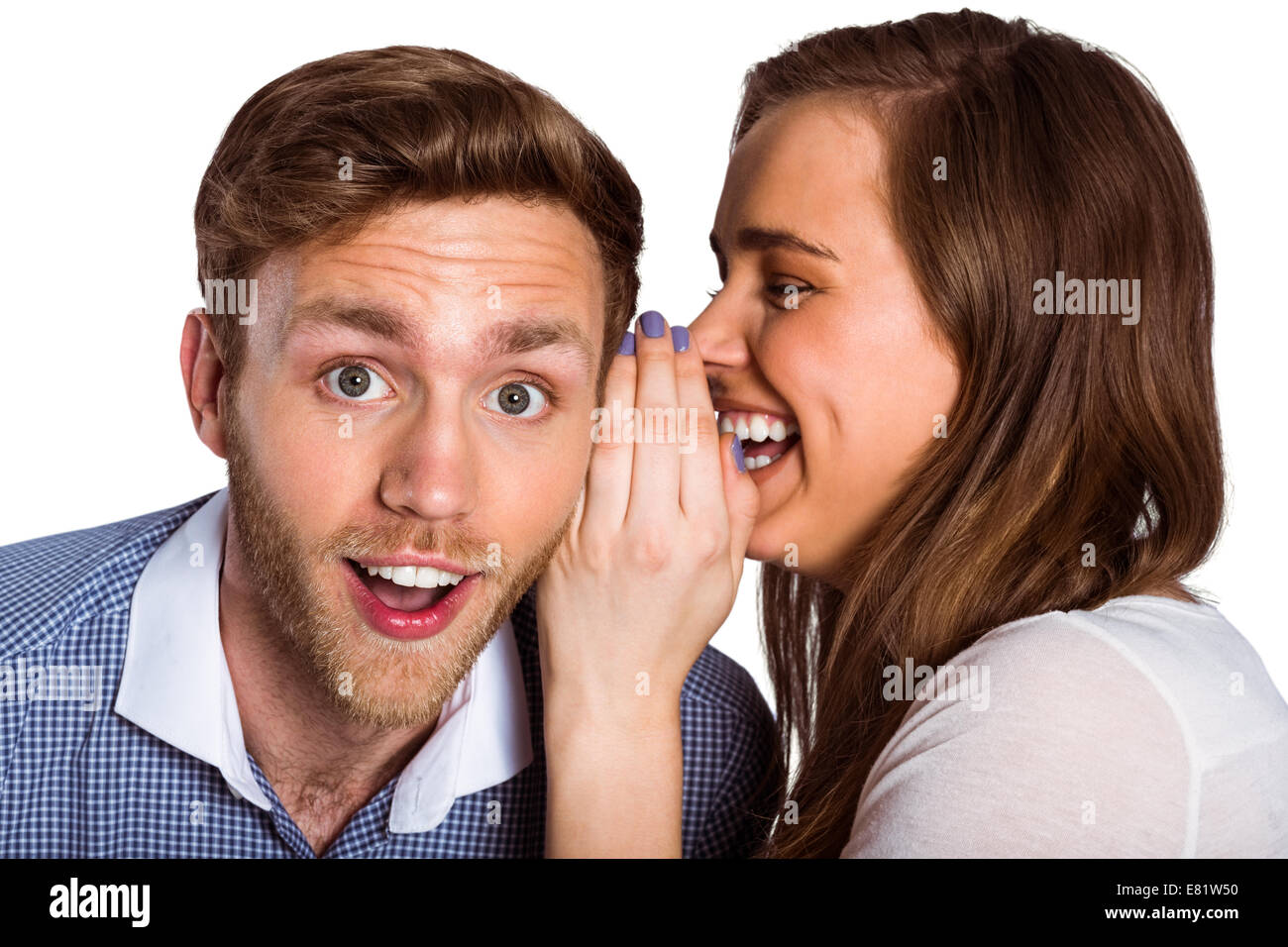 woman whispering secret into friends ear Stock Photo - Alamy