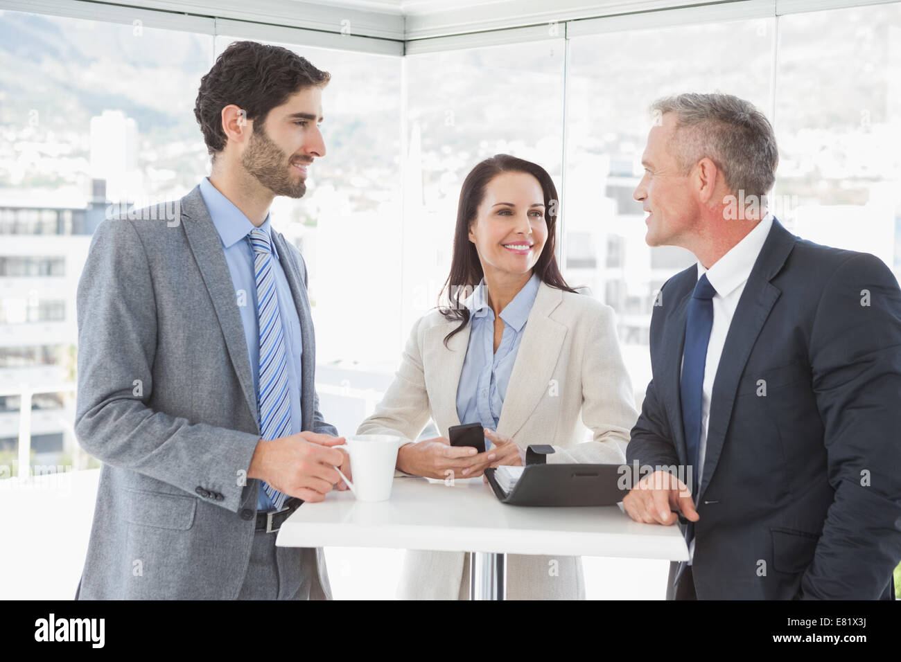 Business team enjoying their break Stock Photo - Alamy
