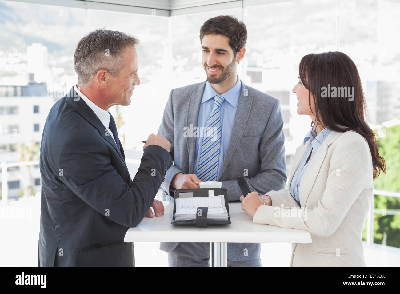 Business team enjoying their break Stock Photo - Alamy